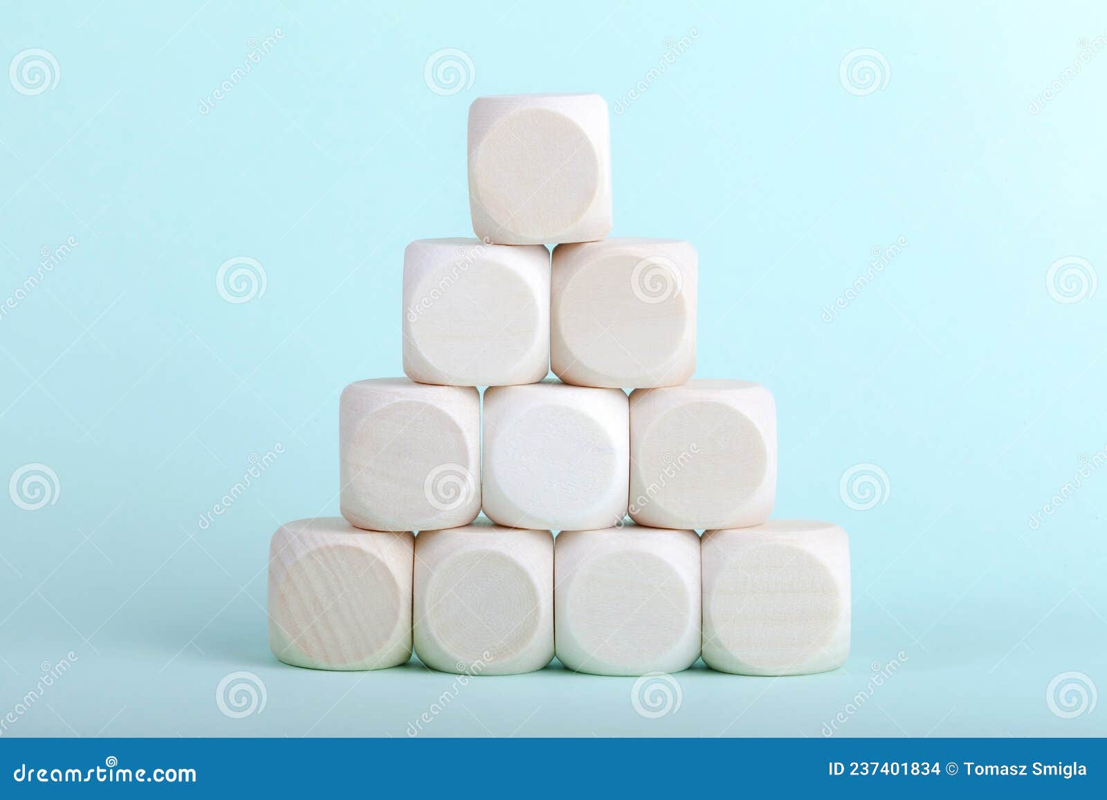 Simple Pyramid Made of Small Empty Blank Wooden Blocks, Cubes on Light ...