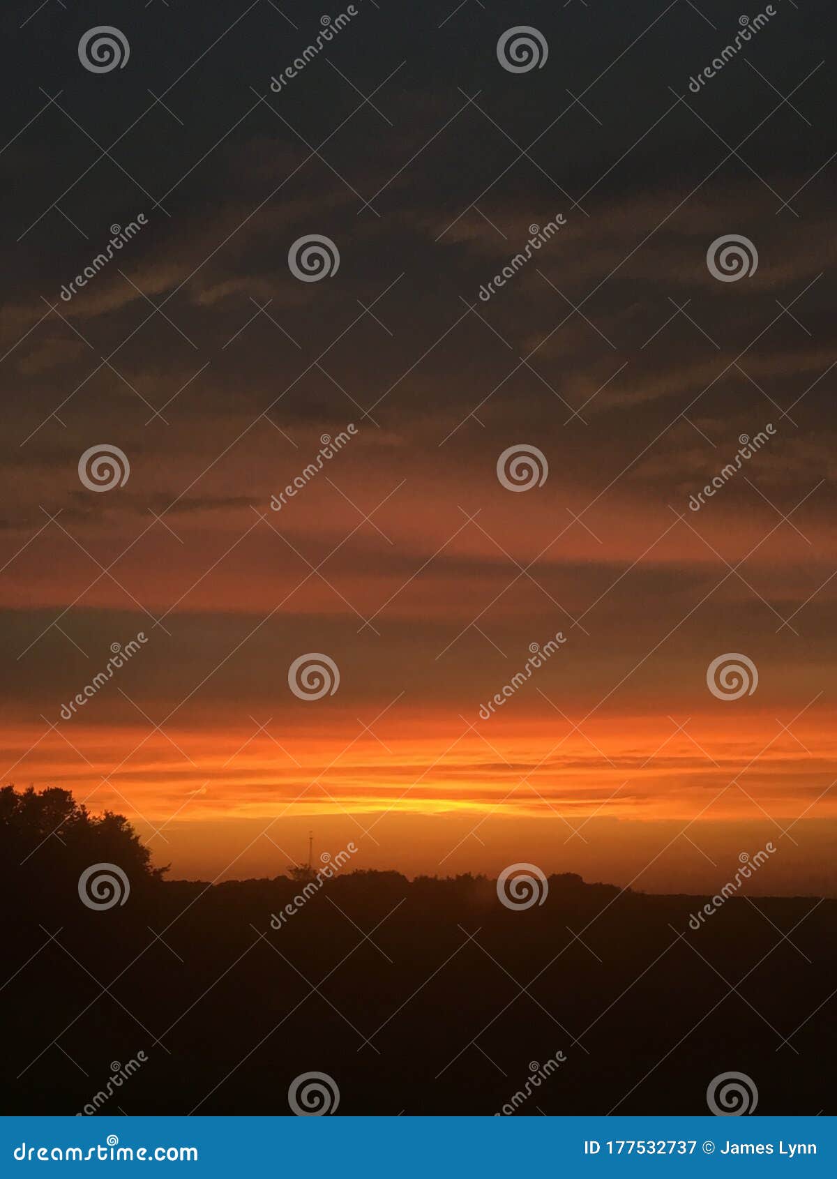 Simple Setting Sun Over a Valley Stock Image - Image of setting ...