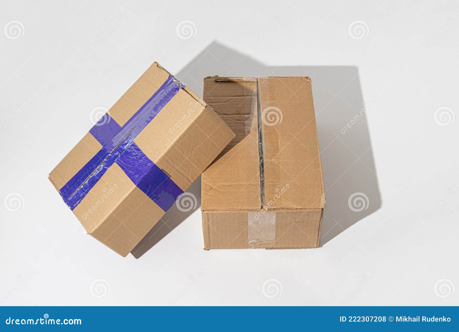 A the Simple Stack of Carton Box Delivery on Color Surface Stock Photo ...