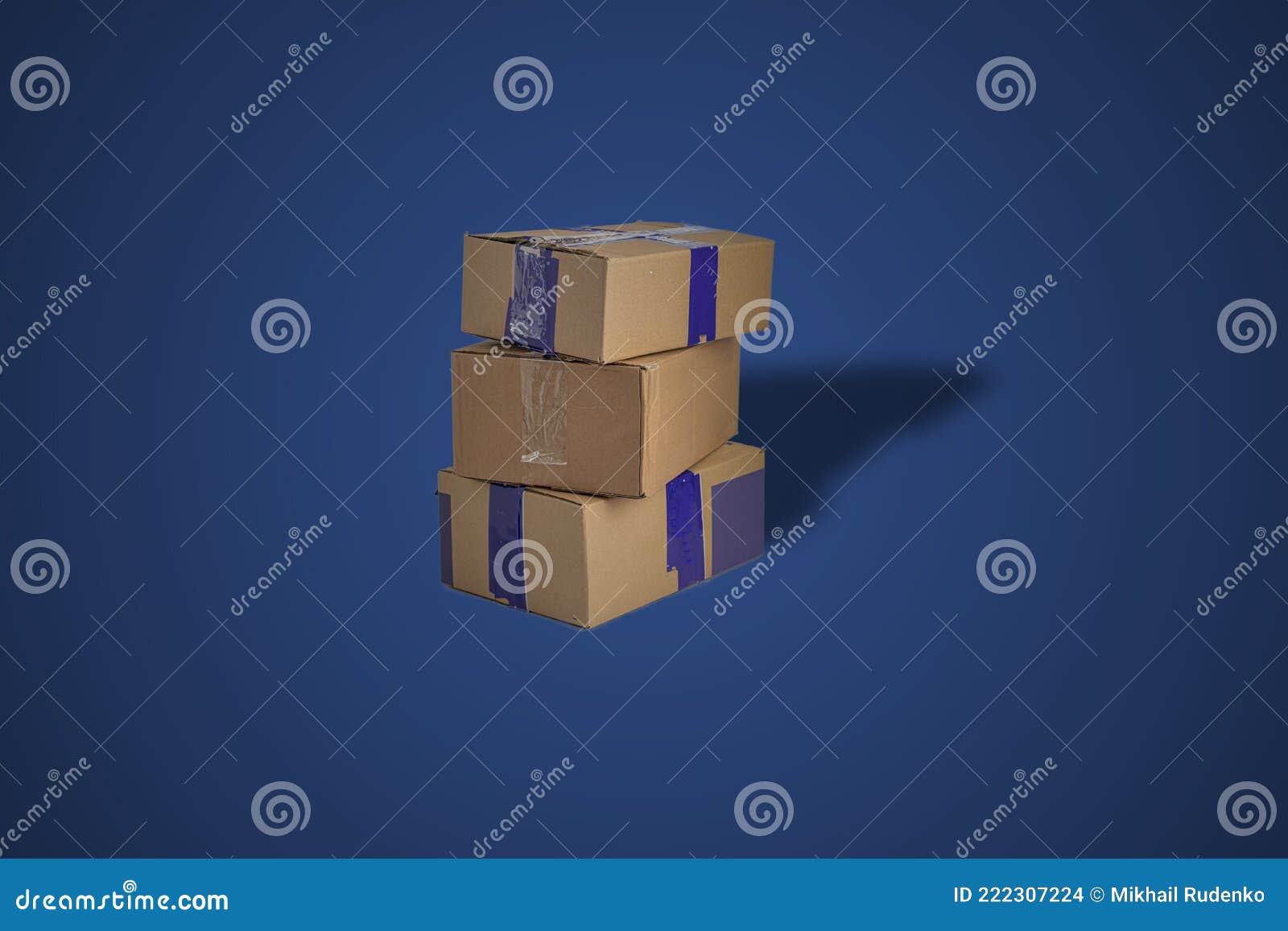 A the Simple Stack of Carton Box Delivery on Color Surface Stock Photo ...