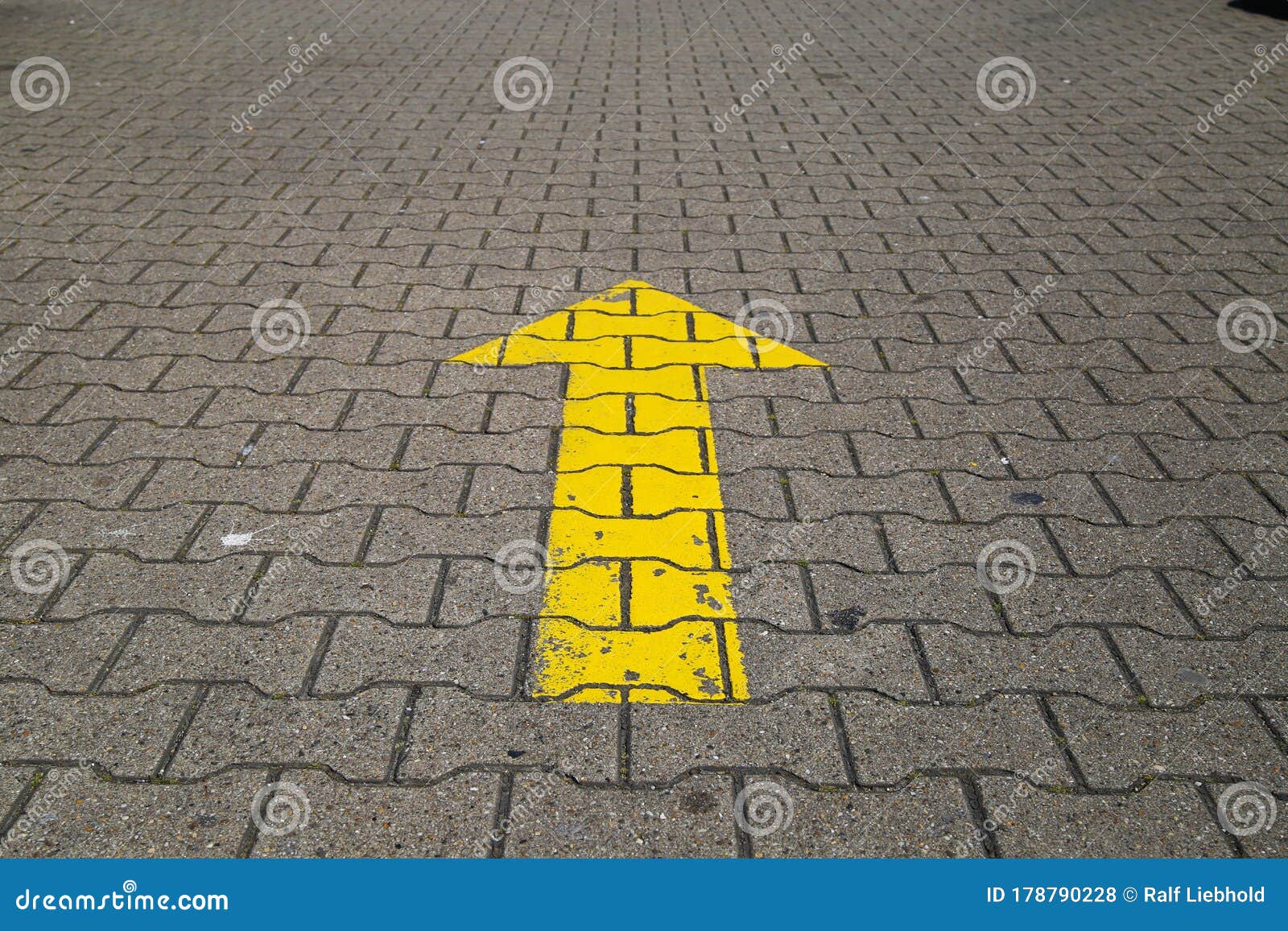 Simple Straightforward Solution Concept: Yellow Arrow An Paving Blocks ...