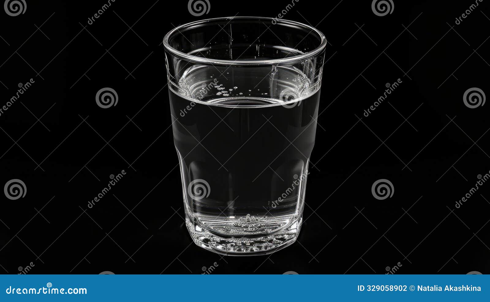 Simple yet Striking Image of a Water-filled Glass with Dramatic ...