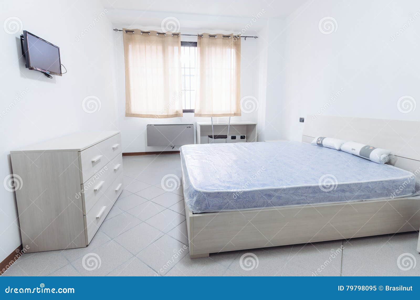 Simple Student-style Dorm Bedroom with Lots of Light Stock Image ...