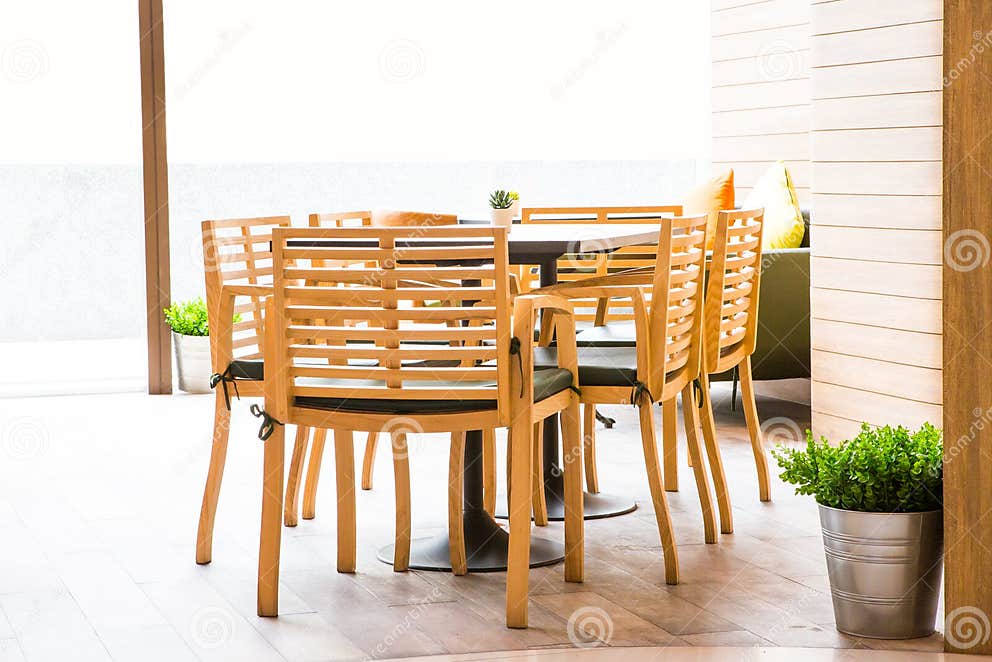 Simple Table and Chair Set in a Restaurant Stock Image - Image of color ...