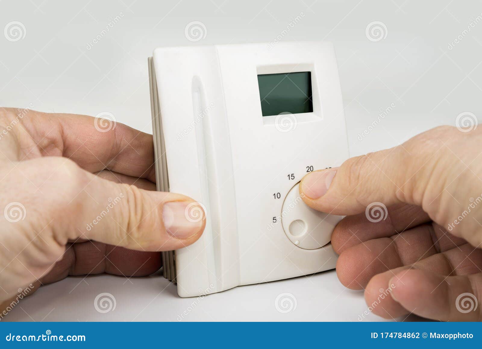 Simple Thermostat for Heating Control on a White Stock Photo - Image of ...