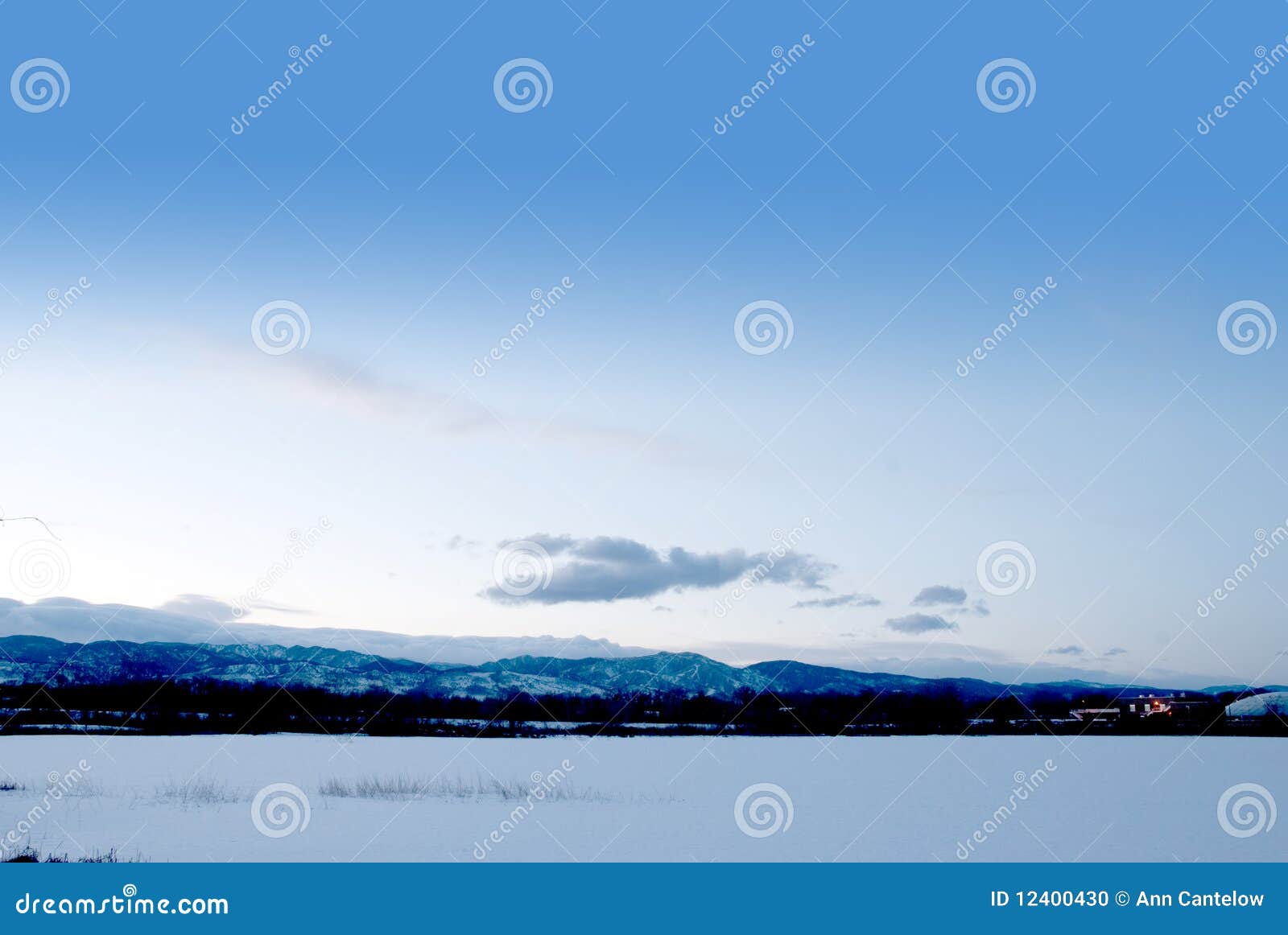 Simple View of Distant Snowy Mountains Stock Photo - Image of twilight ...