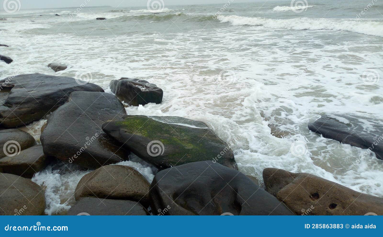 A Simple View of the Waves Breaking on the Smooth Rocks Stock Image ...