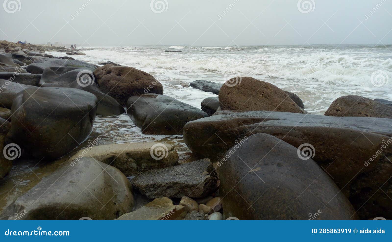 A Simple View of the Waves Breaking on the Smooth Rocks Stock Image ...