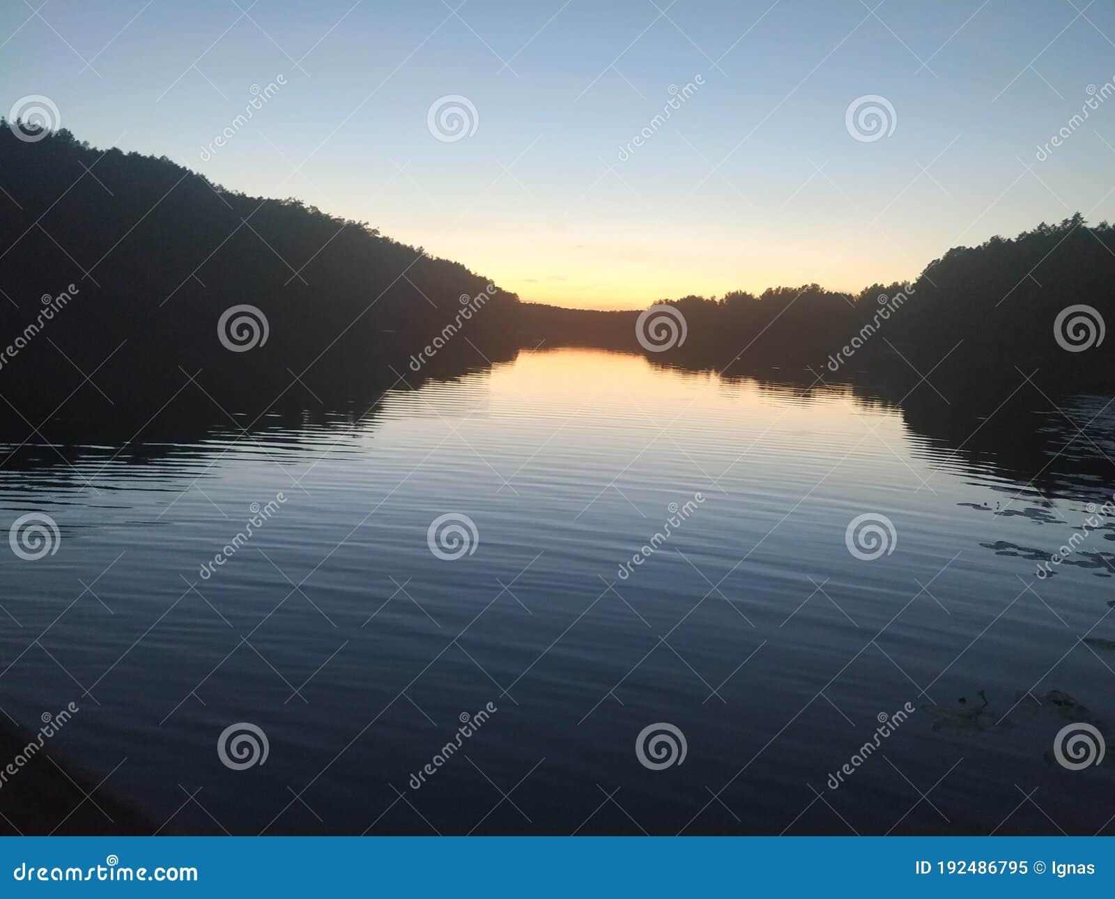 Simple water and sky stock image. Image of river, sunrise - 192486795