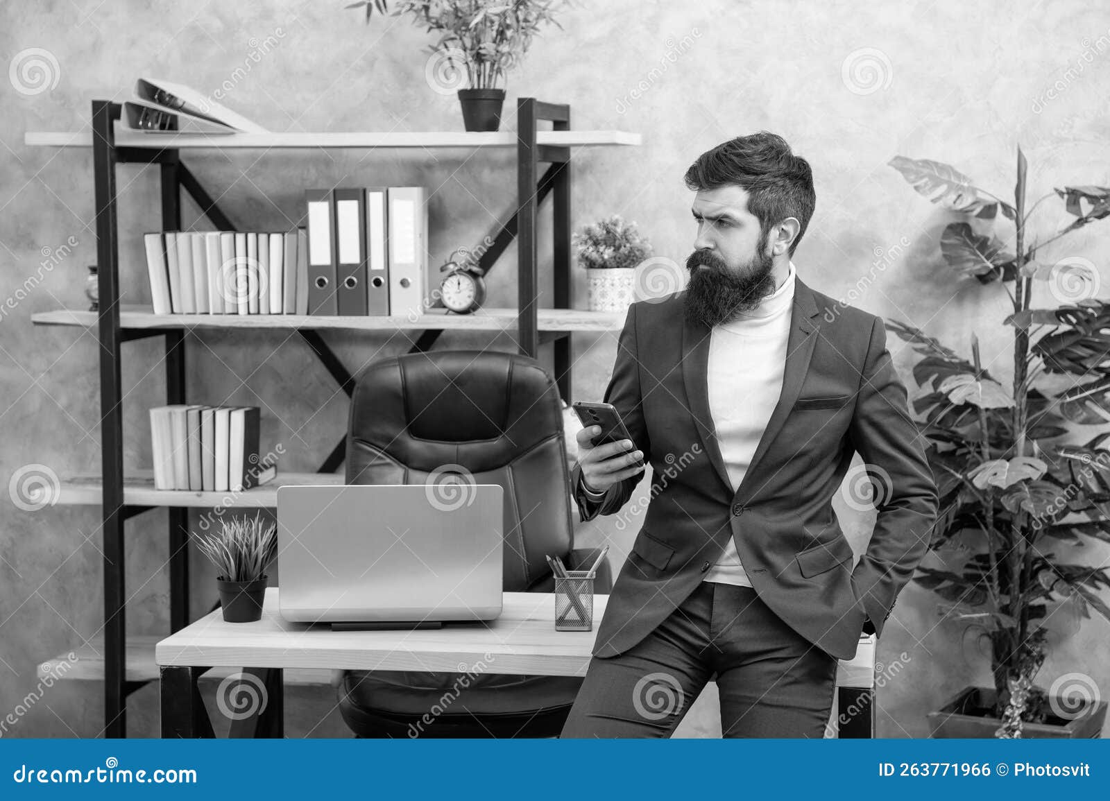 Simple Way To Connect. Serious Man Using Smartphone at Work. Smartphone ...