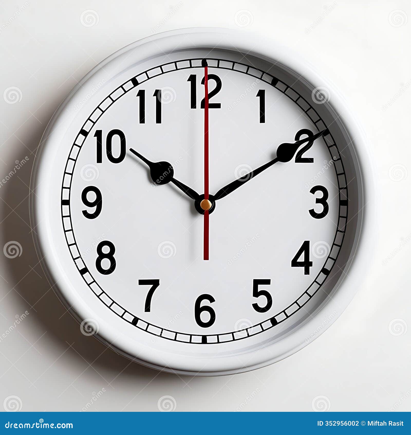 A Simple White Analog Clock Shows Twelve Oclock Stock Photo - Image of ...