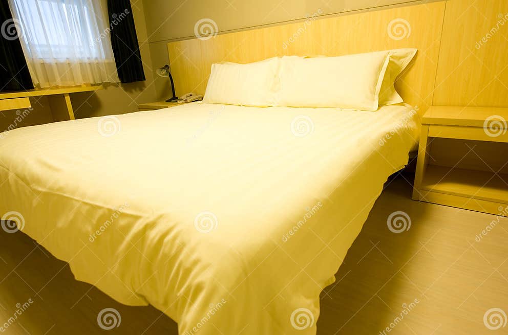 Simple white bed stock image. Image of hotel, fluffy - 17293123