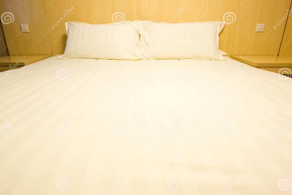 Simple white bed stock image. Image of cushion, decorate - 17293129