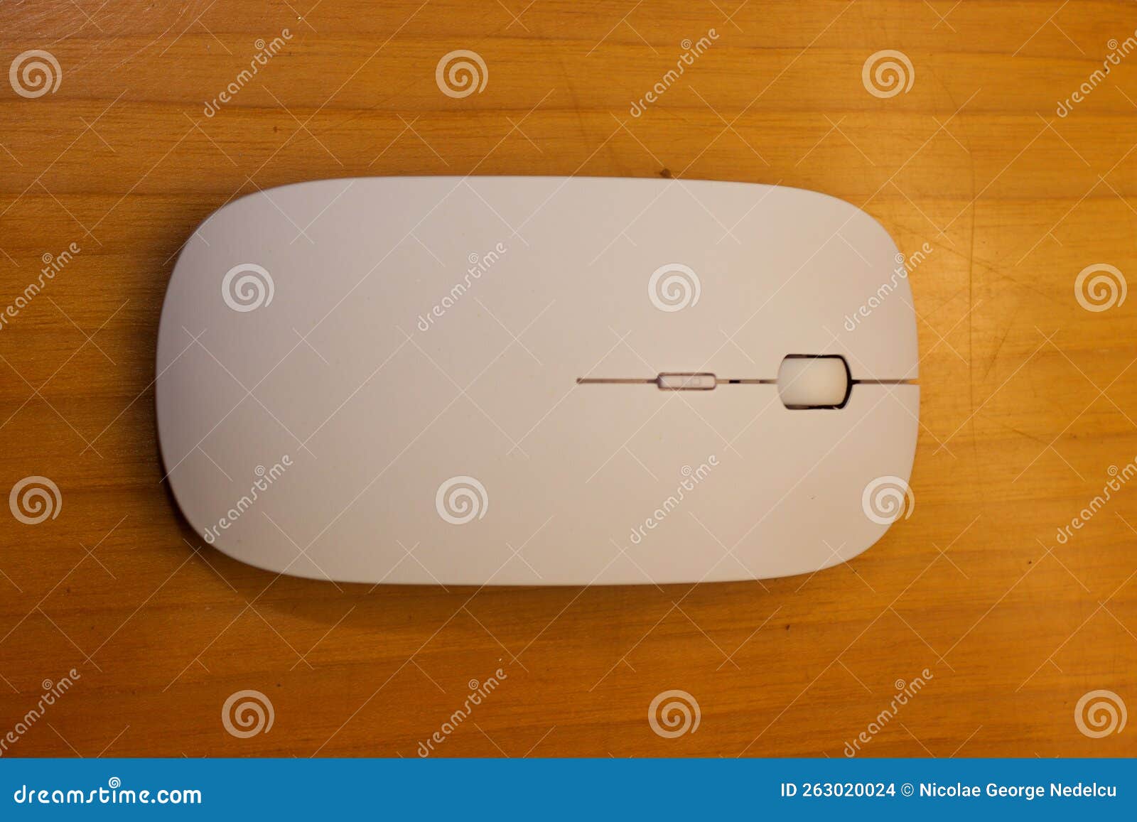 A Simple White Mouse Design Illustrated on a Woody Surface Stock Photo ...