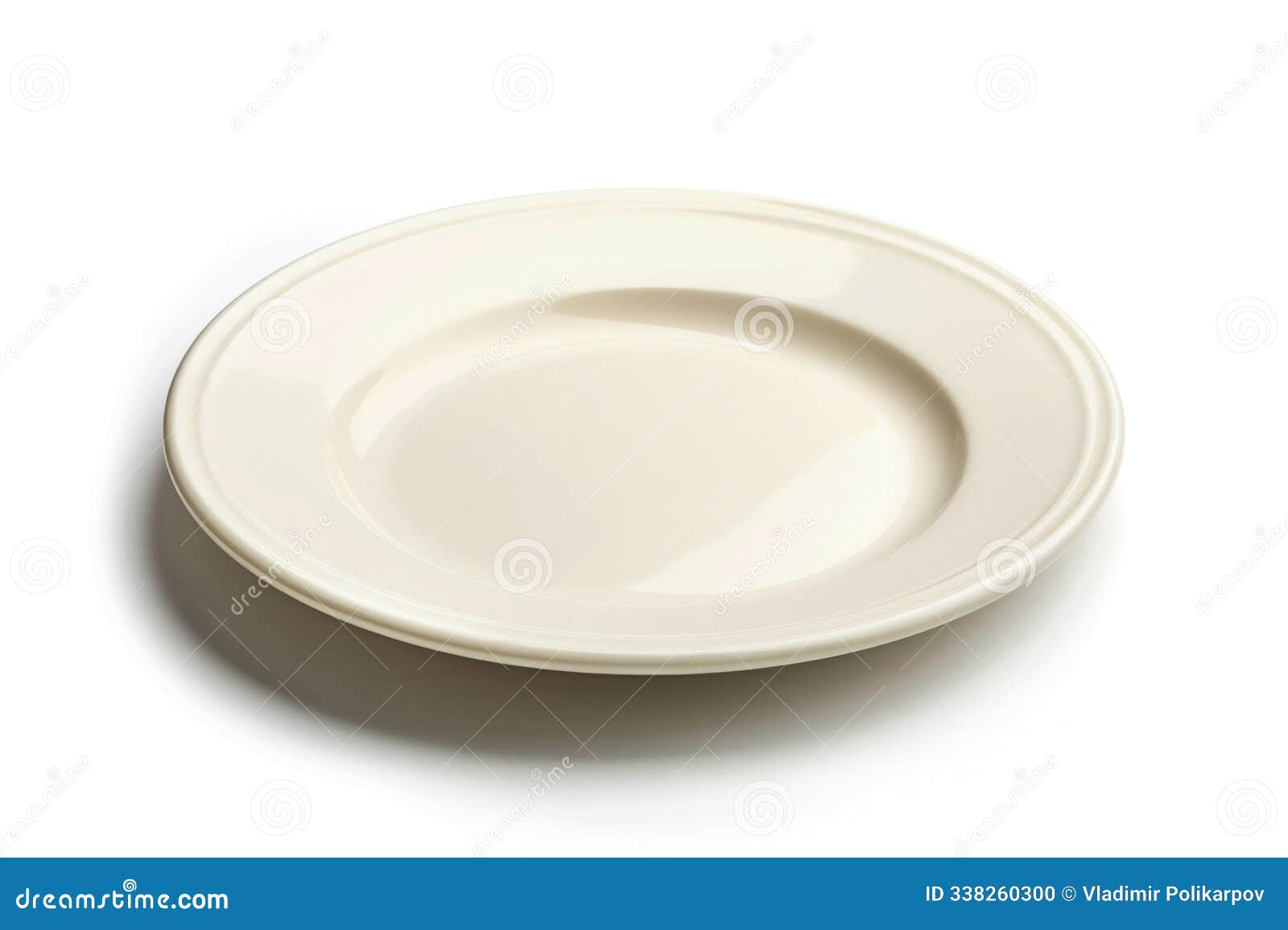A Simple White Plate Sits on a Table, Ready for Use Stock Photo - Image ...