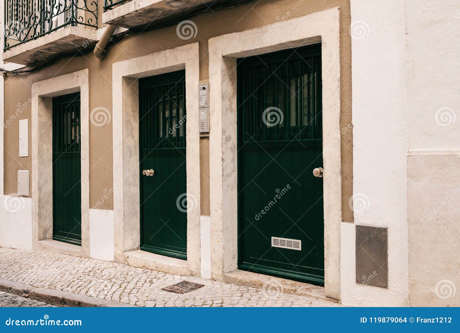 Simple Wooden Entrance Doors are Arranged in a Row Stock Photo - Image ...