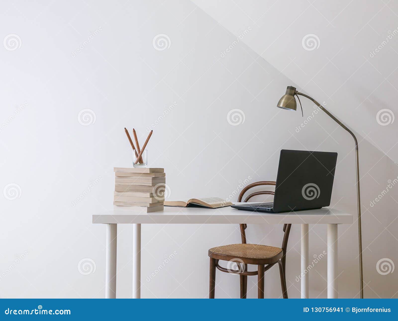 Simple Workspace Interior. Laptop Computer and Open Book Stock Image ...