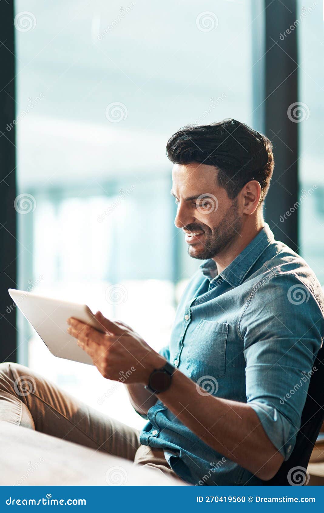 Simplifying Any Work Task with Smart Apps. a Young Businessman Using a ...