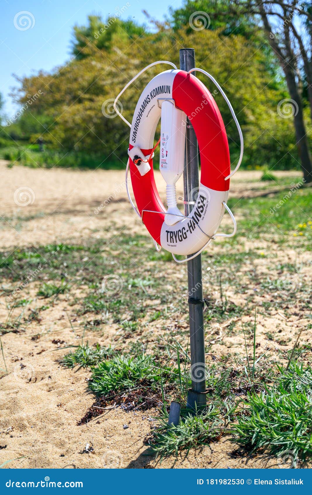 Simrishamn, Sweden - 13 May 2019: Lifebuoy on an Empty Sandy Beach on a ...