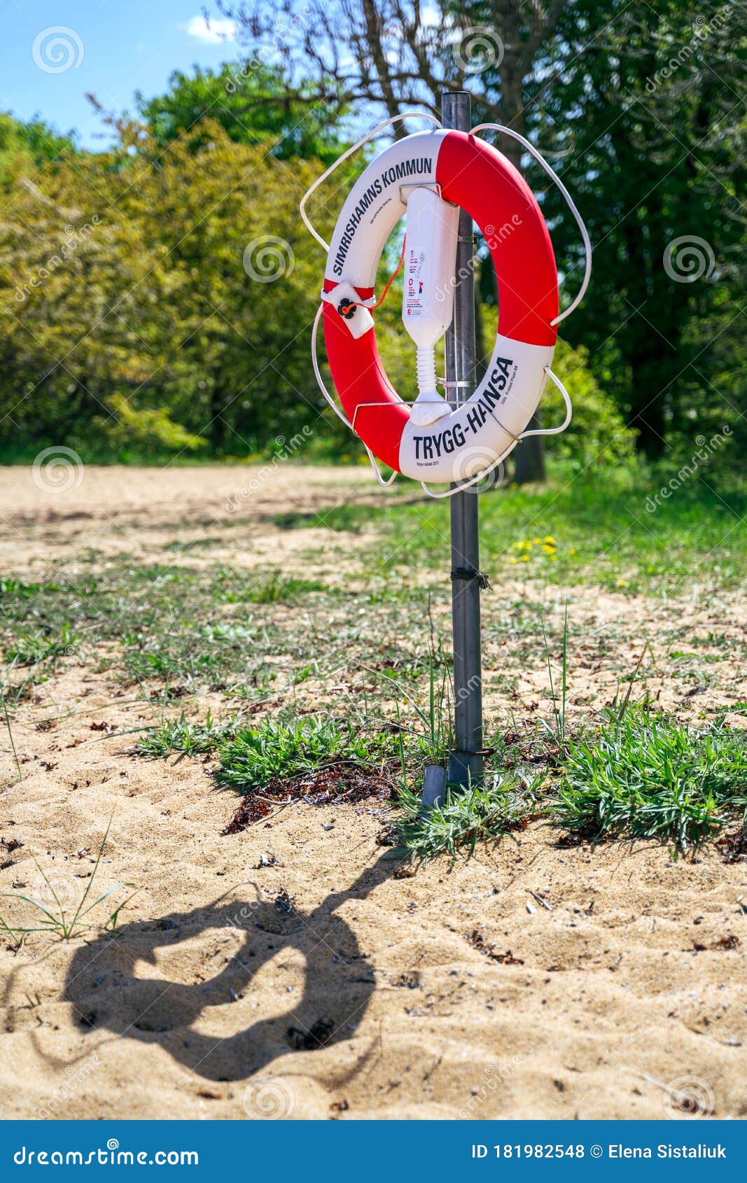 Simrishamn, Sweden - 13 May 2019: Lifebuoy on an Empty Sandy Beach on a ...