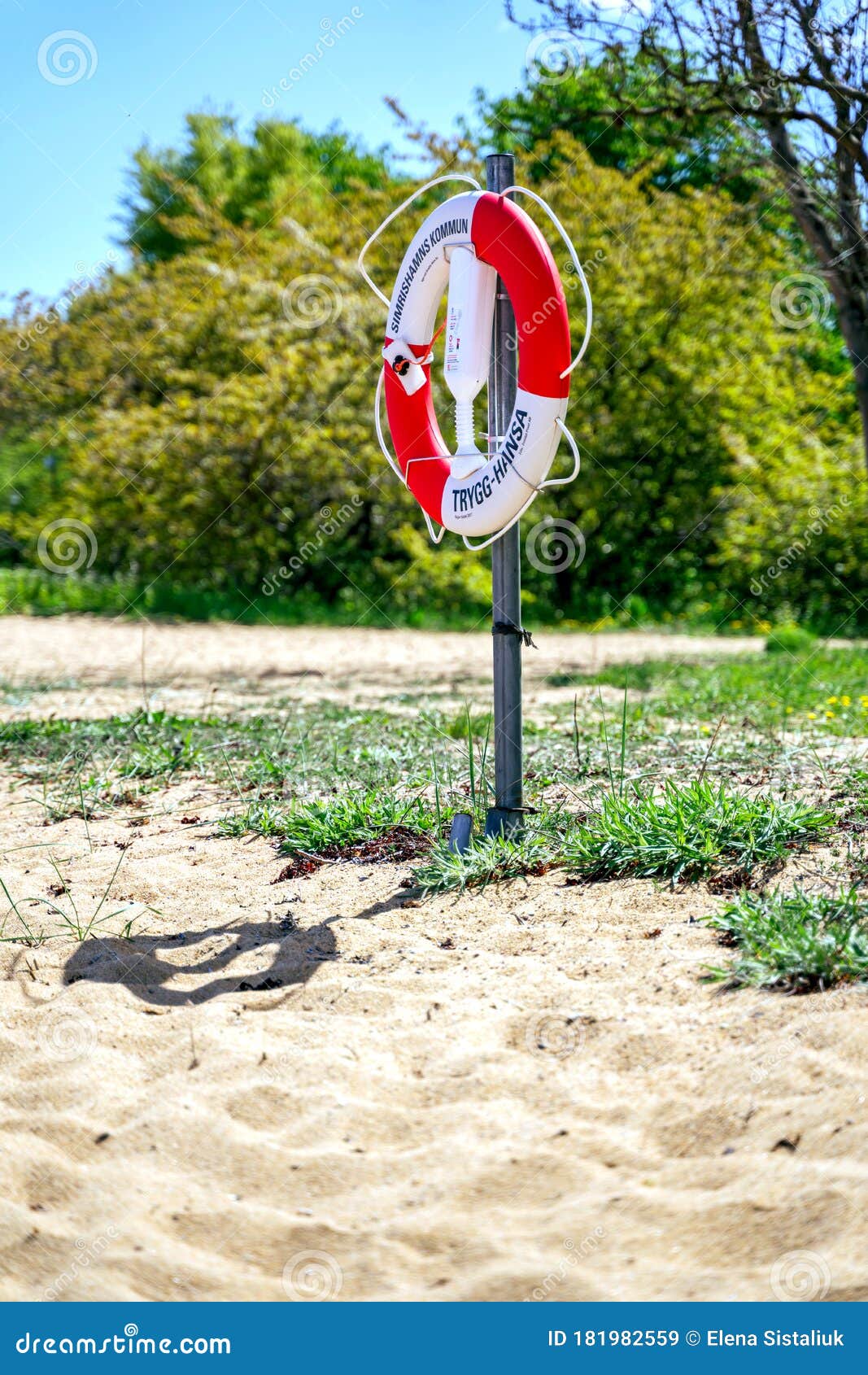 Simrishamn, Sweden - 13 May 2019: Lifebuoy on an Empty Sandy Beach on a ...