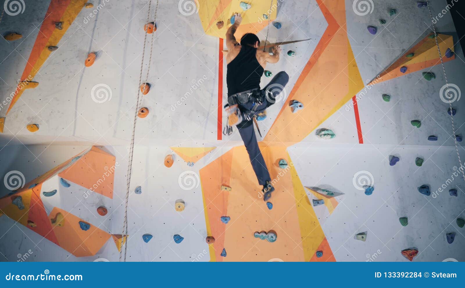 Simulation Wall is Being Clambered by a Skillful Man Stock Footage ...