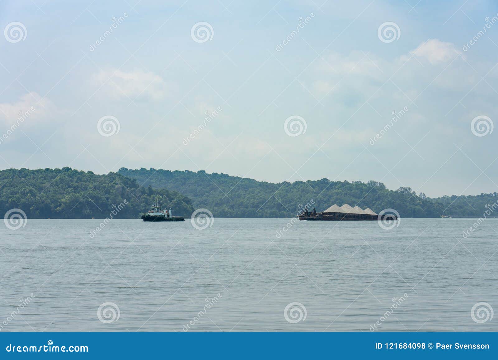 Tug boat pulling a barge stock photo. Image of industry - 121684098