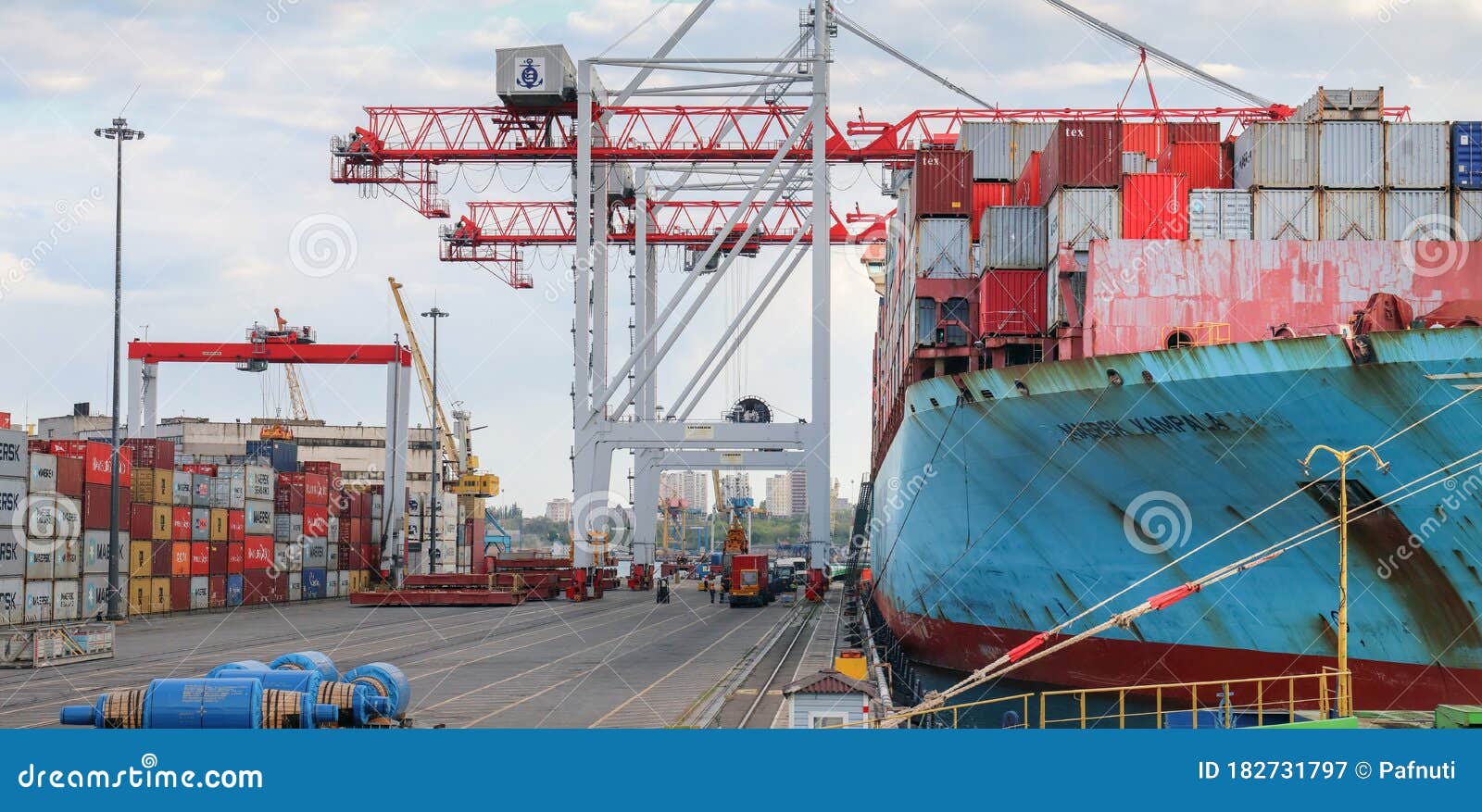 SINGAPORE - MAY 08 2020: Container Cargo Ship Load in the Seaport ...