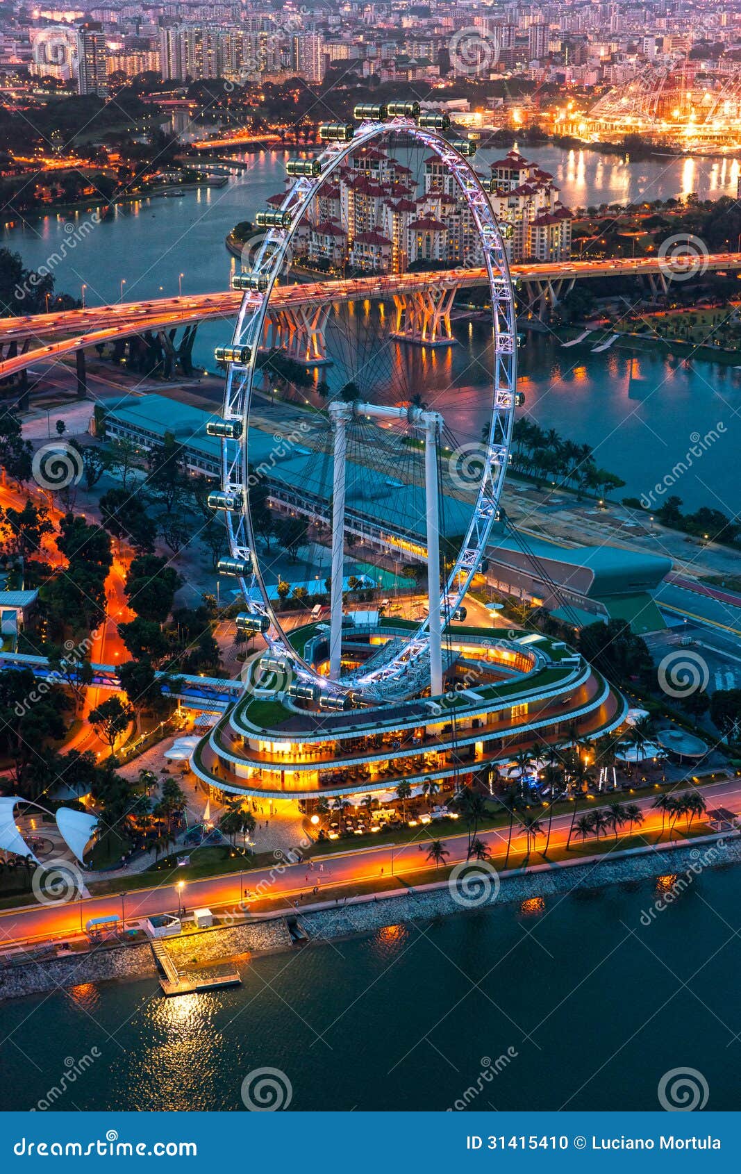 Singapore at Night with the Singapore Flyer. Stock Photo - Image of ...