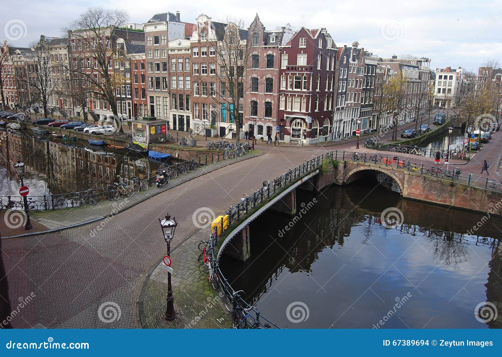Singel canal in Amsterdam. stock photo. Image of city - 67389694