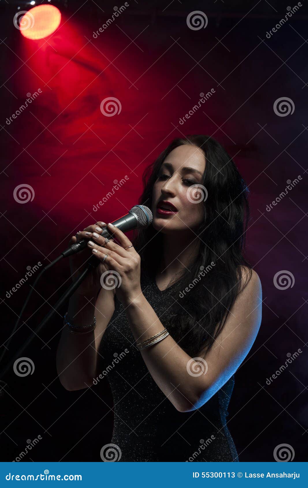 Singer stock image. Image of spotlight, woman, singing - 55300113