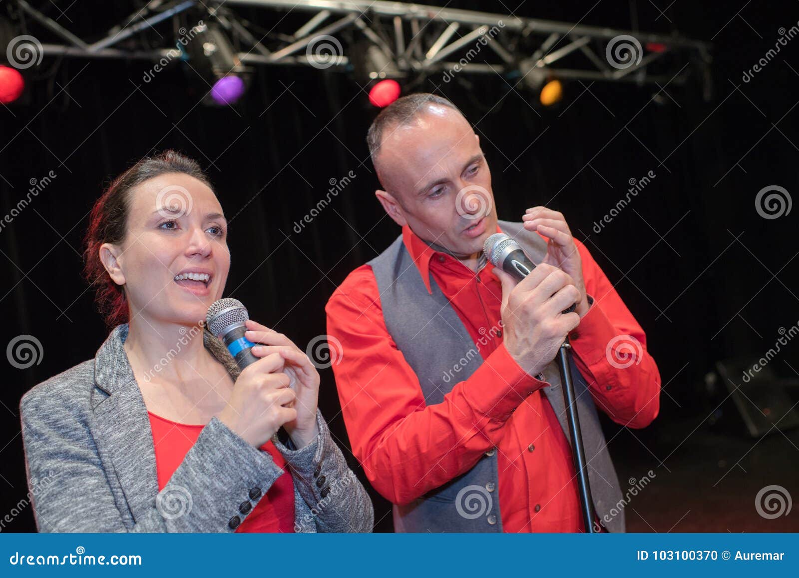 Singer duo in stage stock photo. Image of audience, microphone - 103100370
