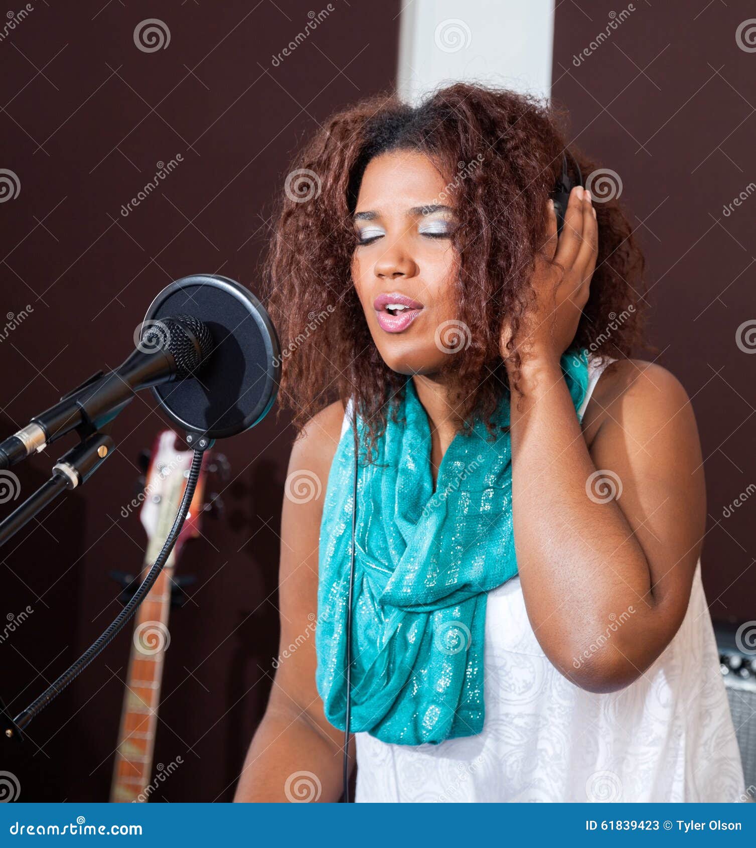 Singer with Eyes Closed Performing in Studio Stock Image - Image of ...