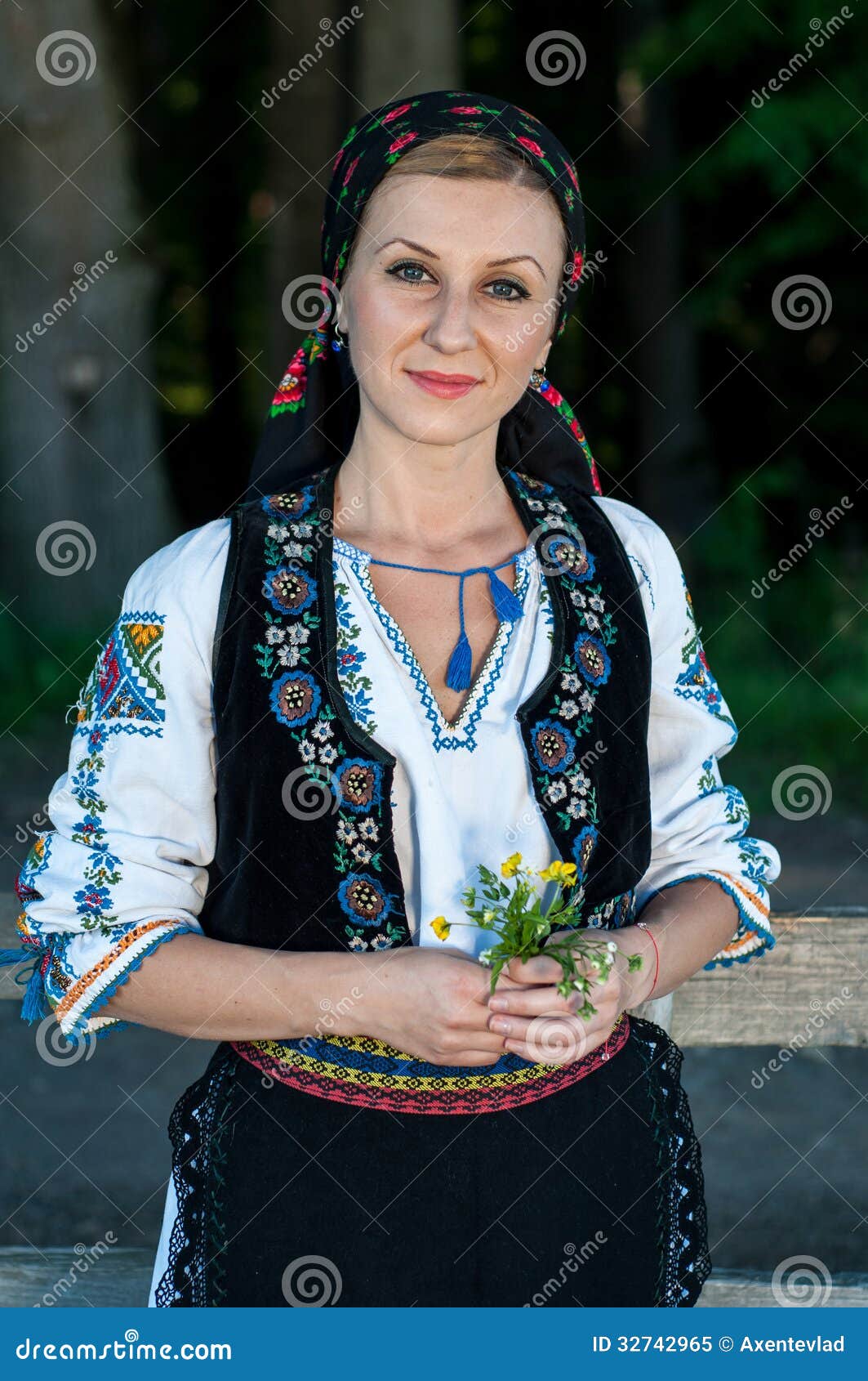 Singer with Flowers in Her Hands Posing at Countryside Stock Image ...