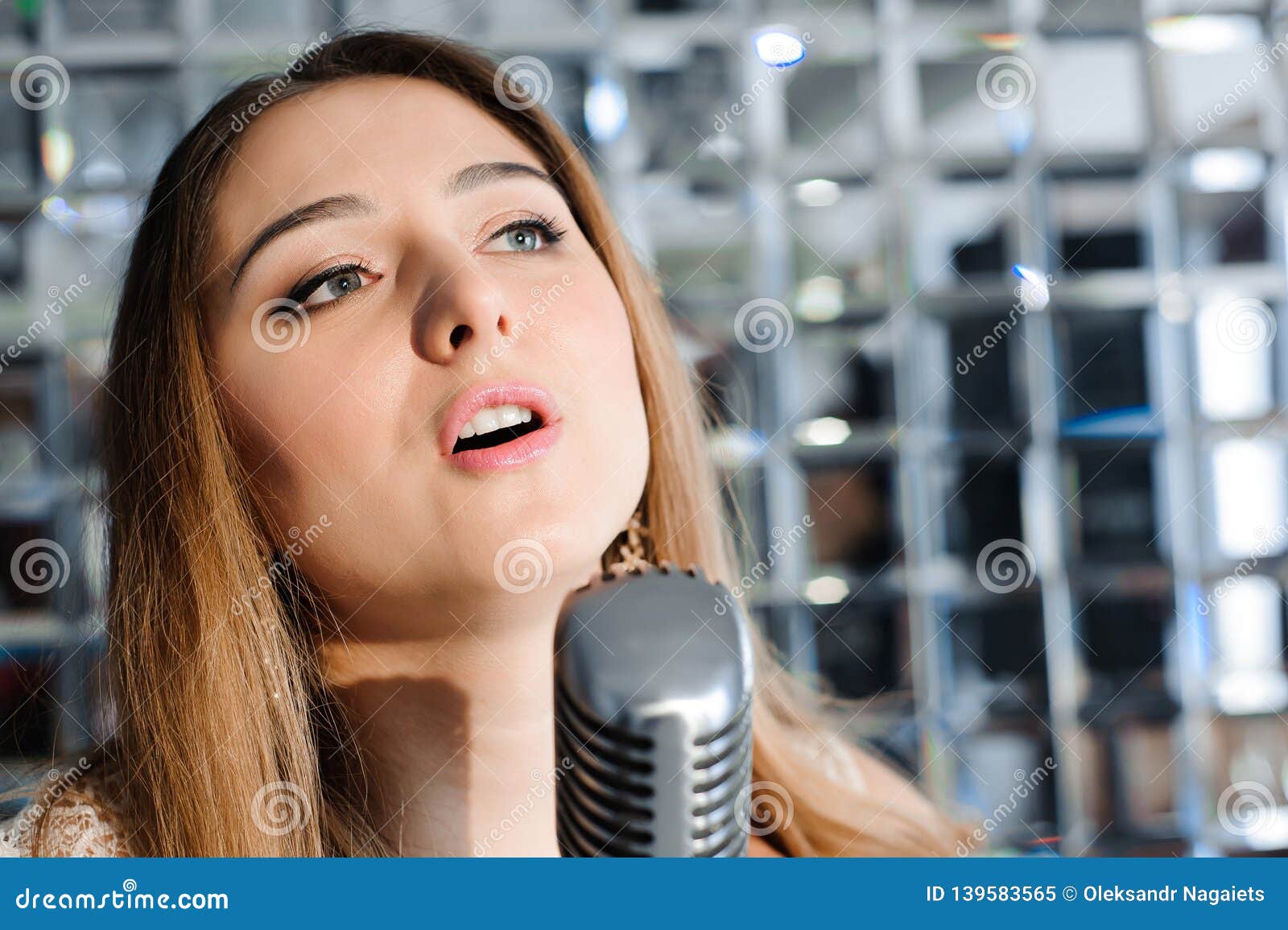 Singer in Front of a Microphone in the Karaoke Club. Stock Image ...