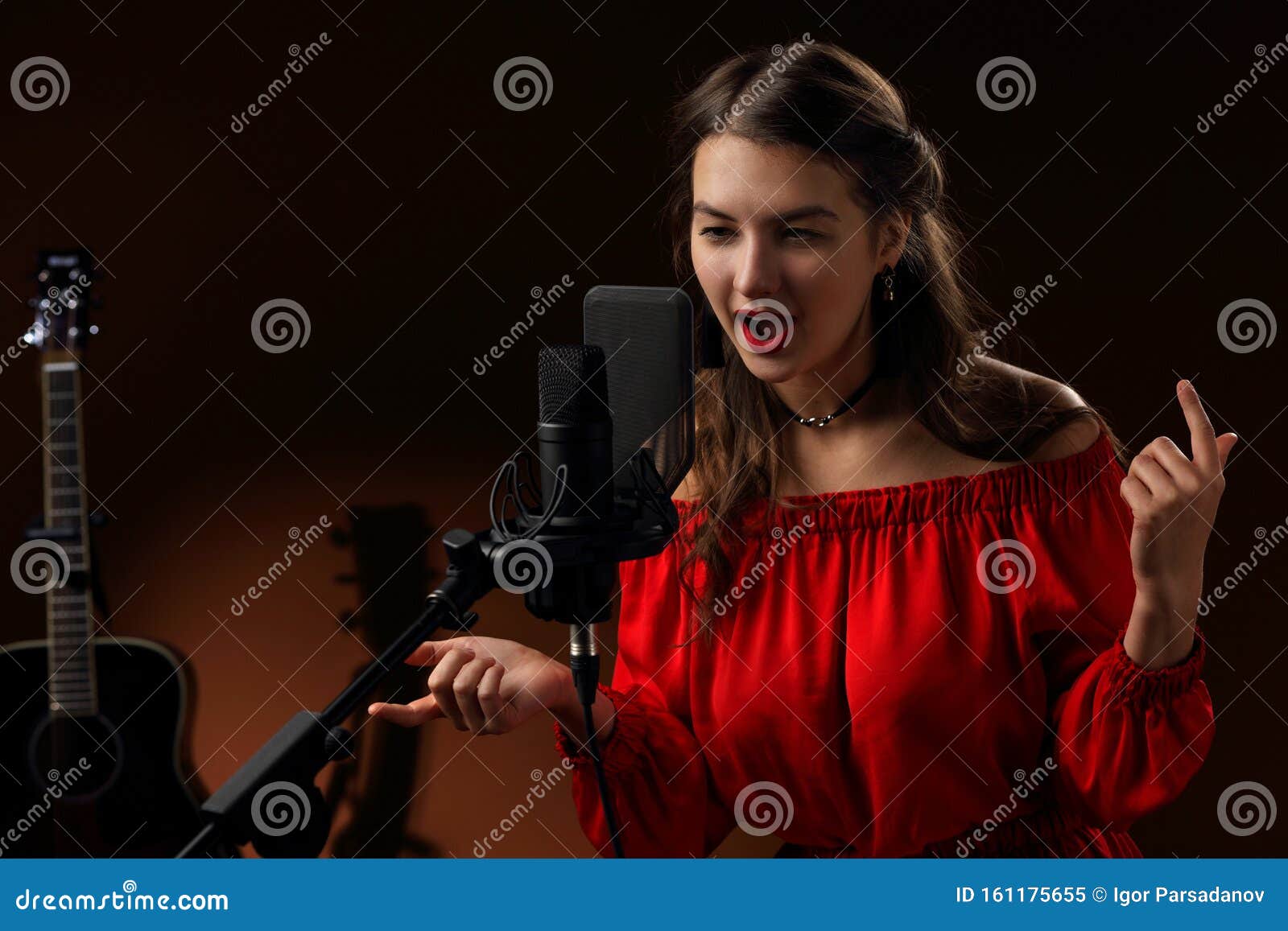 Singer in Front of the Microphone in the Recording Studio Stock Image ...