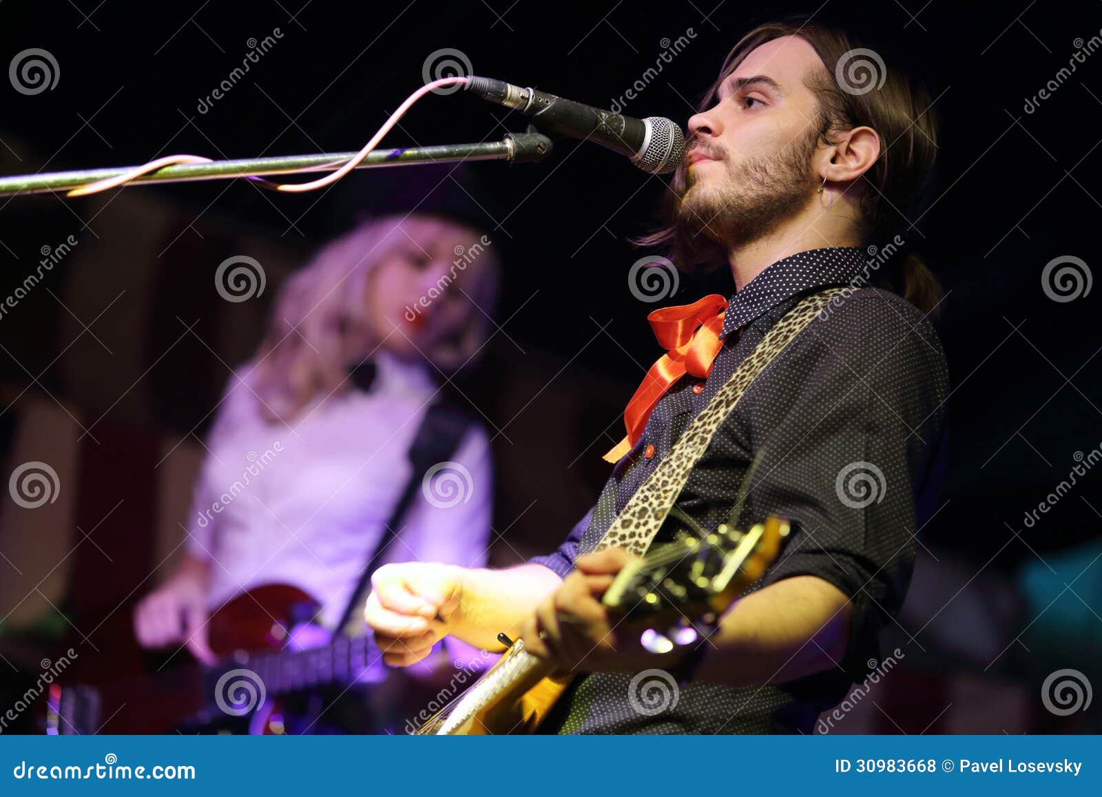 The singer with a guitar stock photo. Image of microphone - 30983668