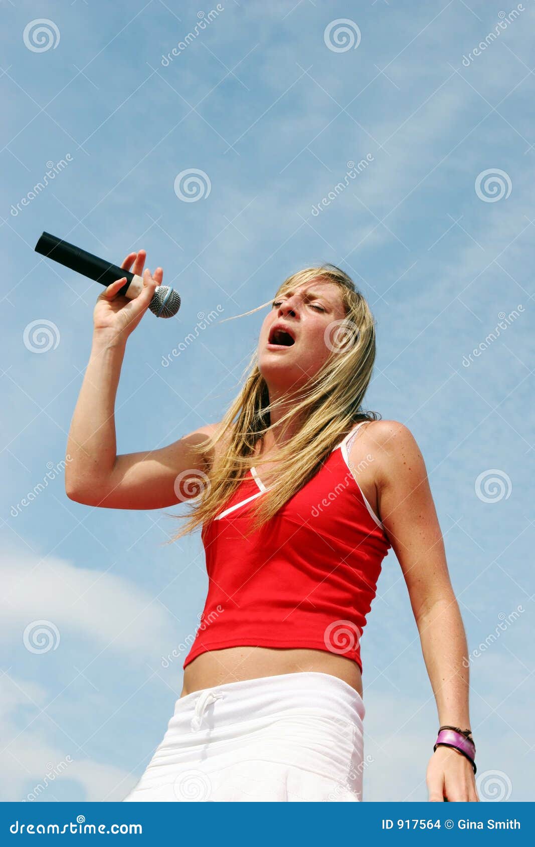 Singer hits the high notes stock photo. Image of gorgeous - 917564