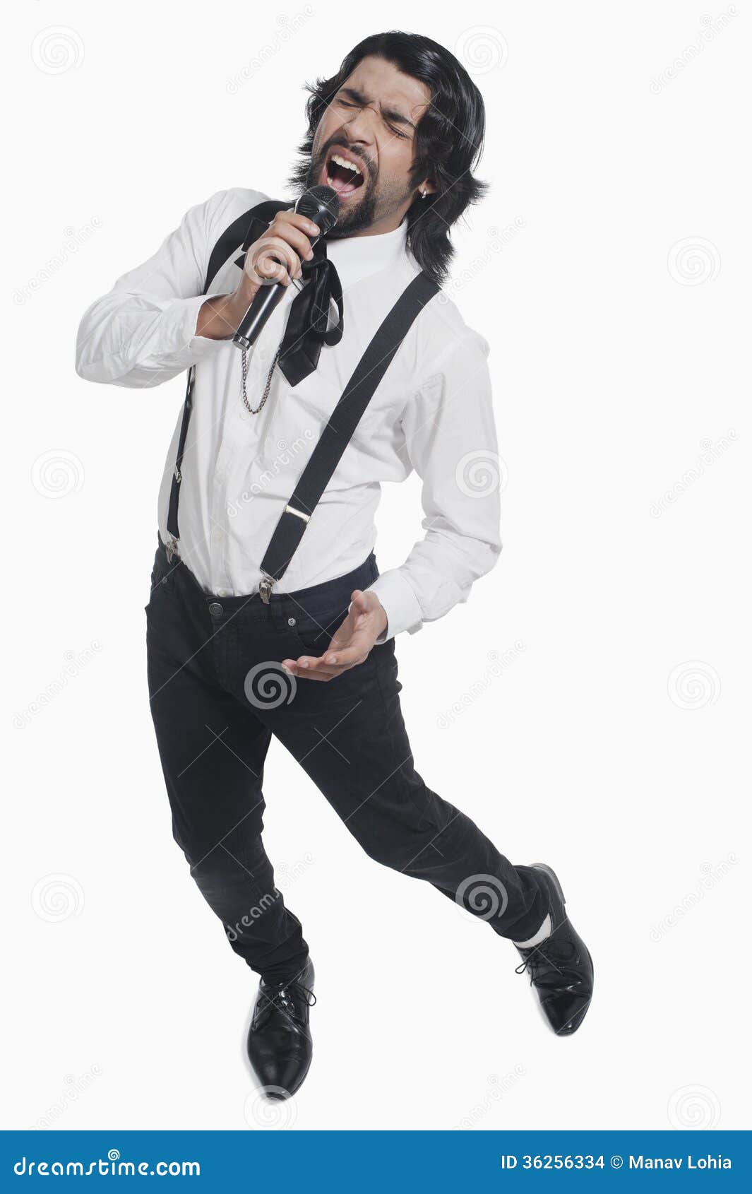 Singer Holding a Mike and Singing Stock Photo - Image of shot ...