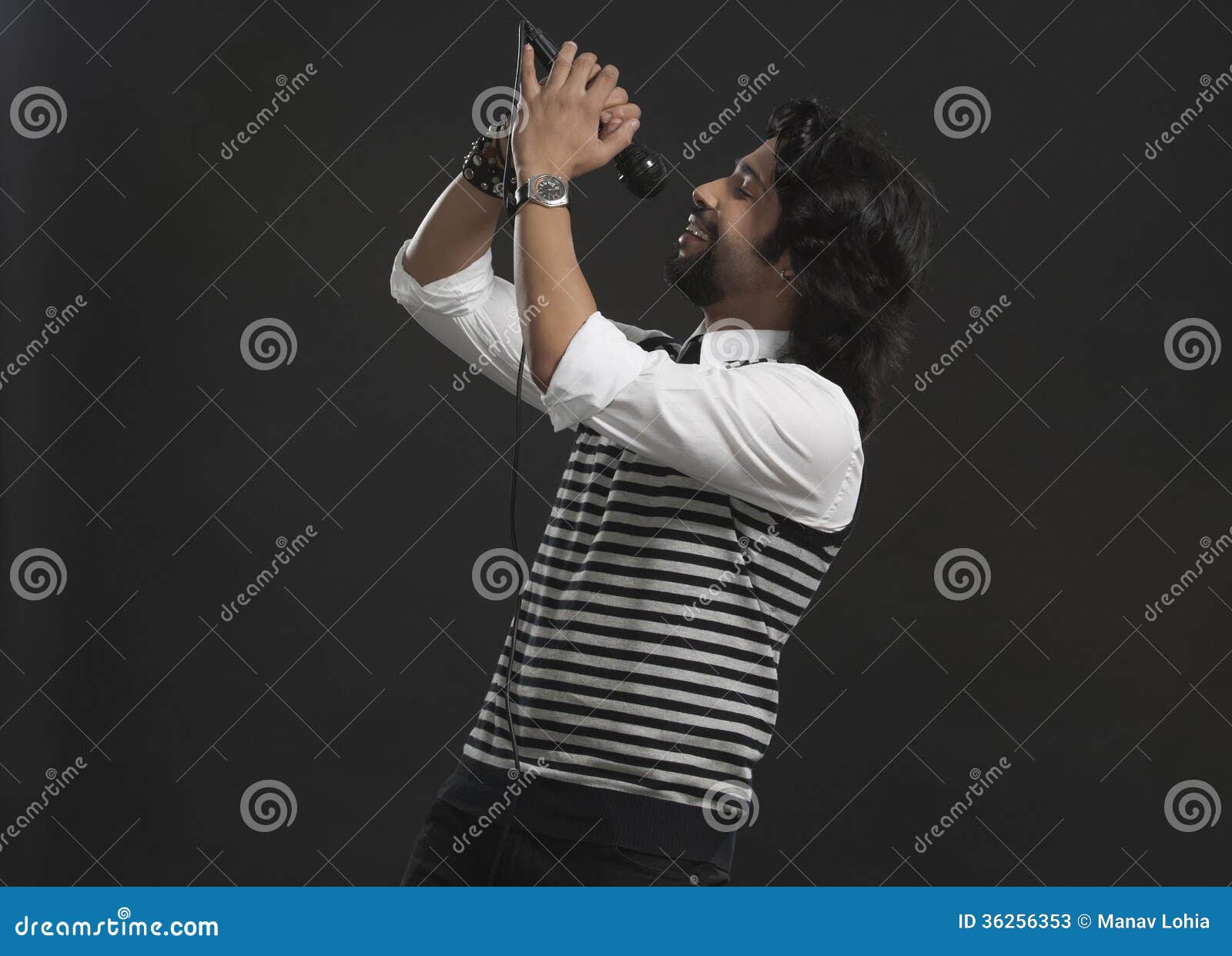 Singer Holding a Mike and Singing Stock Image - Image of ethnicity ...