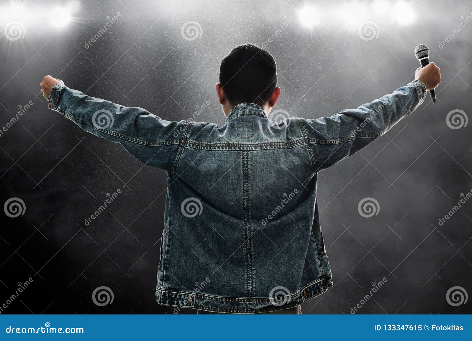 Singer Holding Wireless Microphone on Stage Stock Image - Image of ...