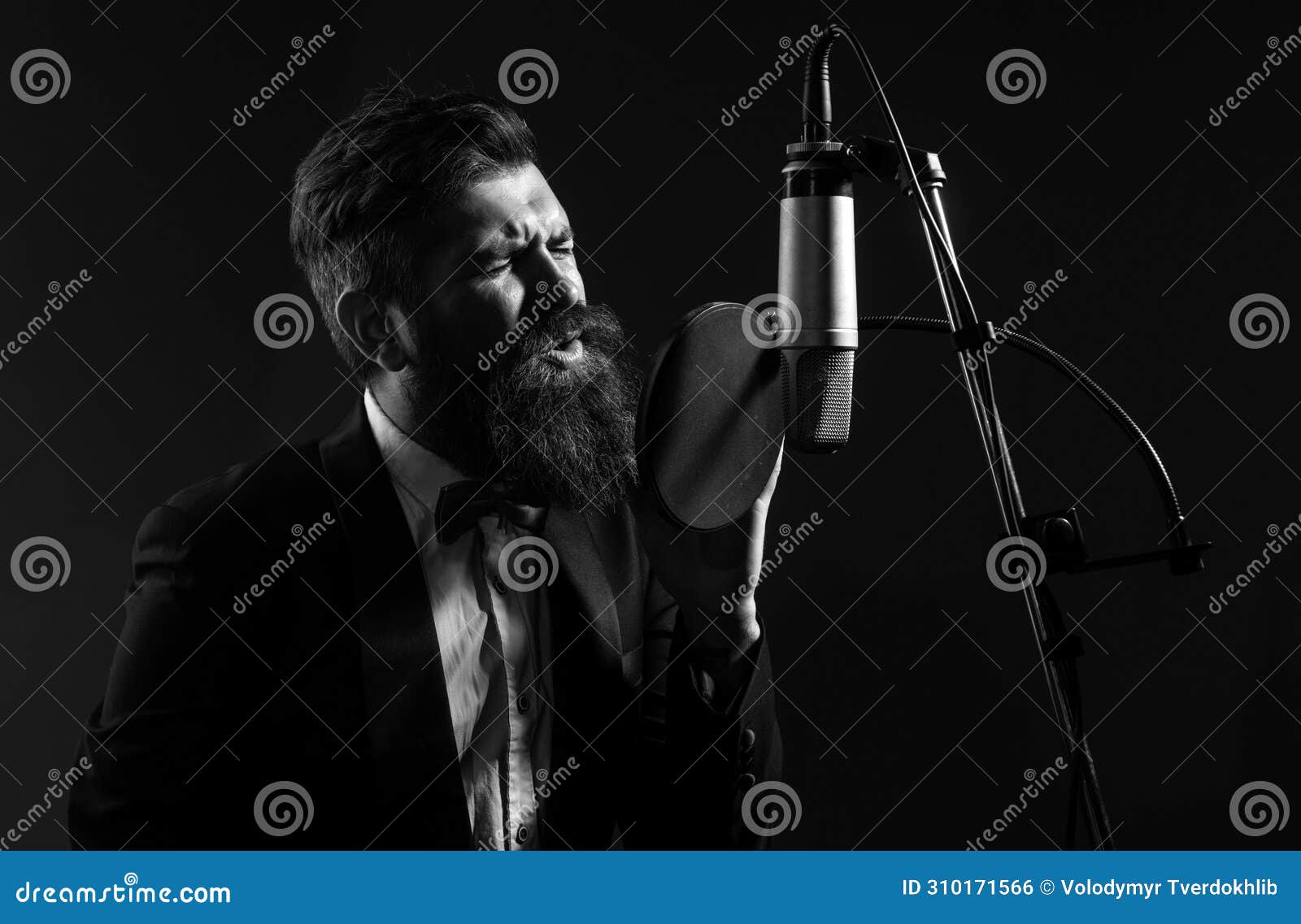 Singer Man Singing with a Music Microphone. Stock Photo - Image of ...