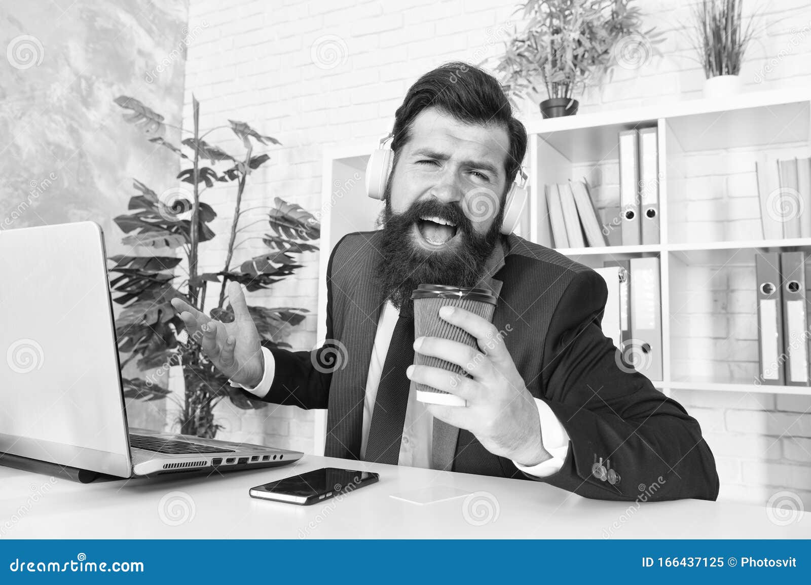 Singer or Manager. Office Manager Sing Karaoke Using Coffee Cup ...