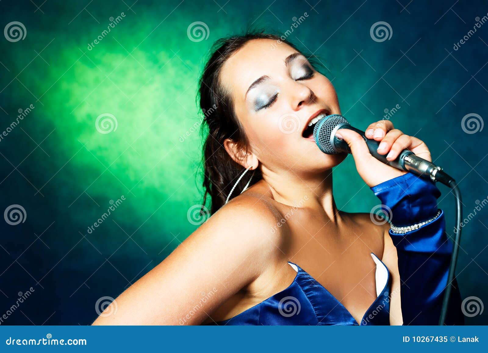 Singer with a microphone stock image. Image of music - 10267435