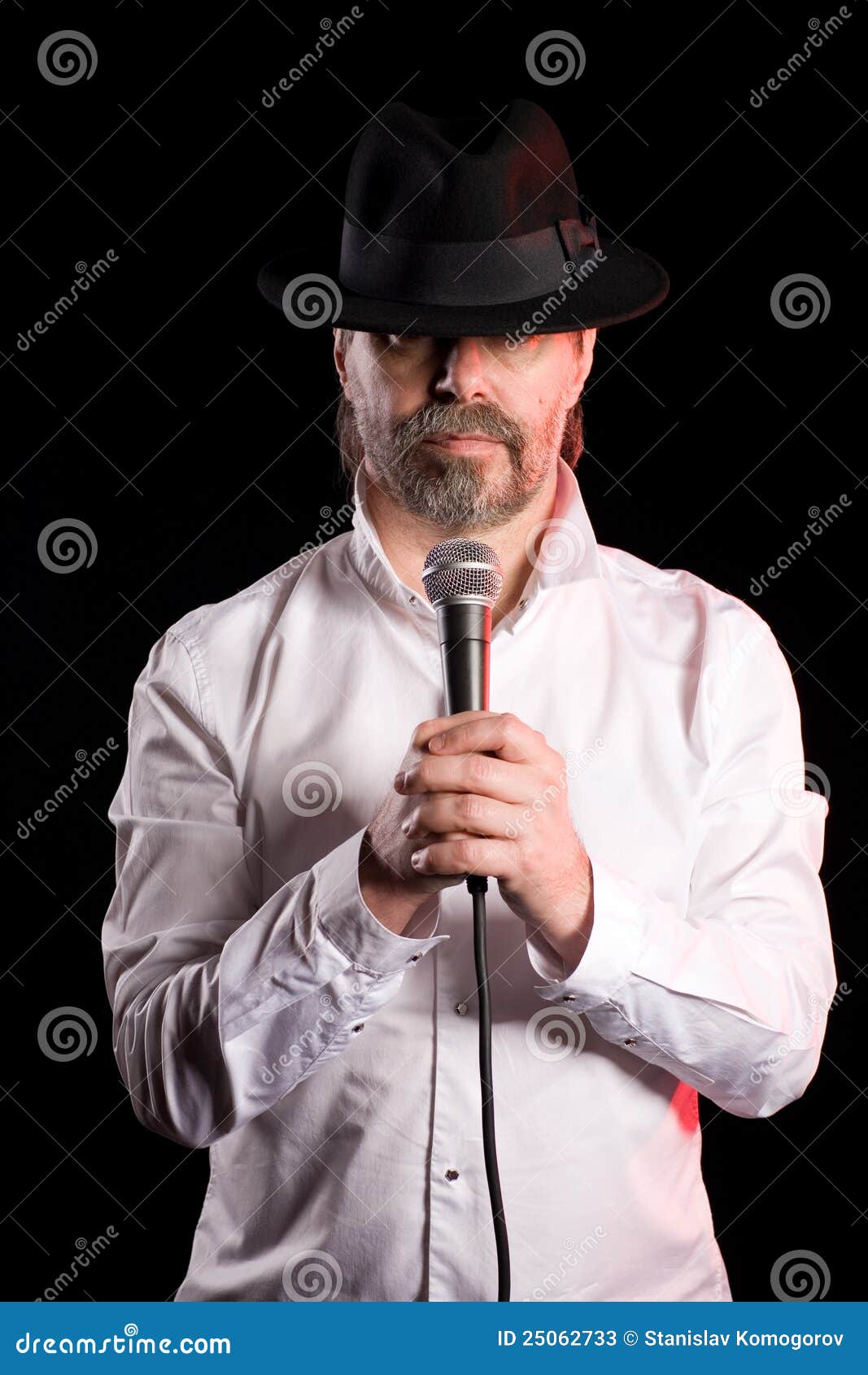 Singer with a microphone stock image. Image of facial - 25062733