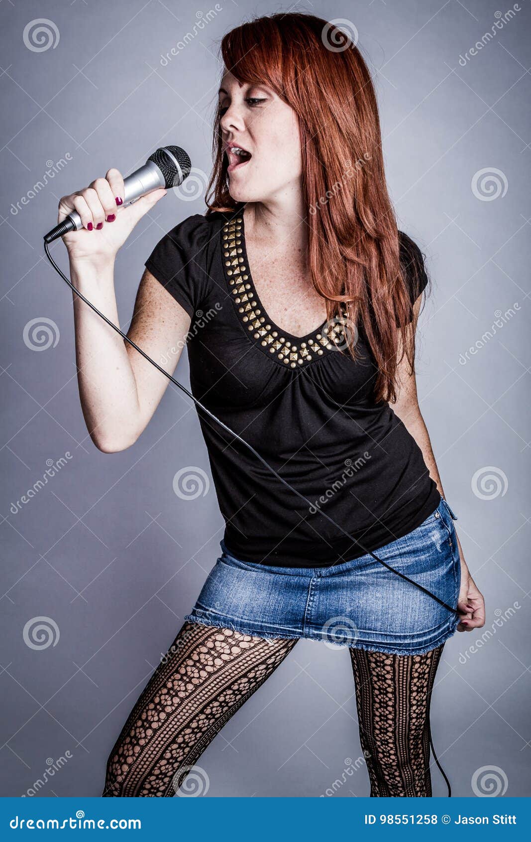 Singer with Microphone stock photo. Image of performer - 98551258