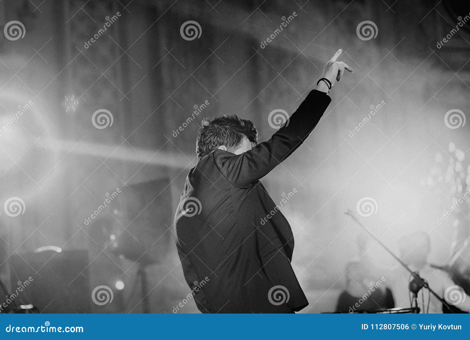 Singer with a Microphone One Hand Bright Light Stock Photo - Image of ...