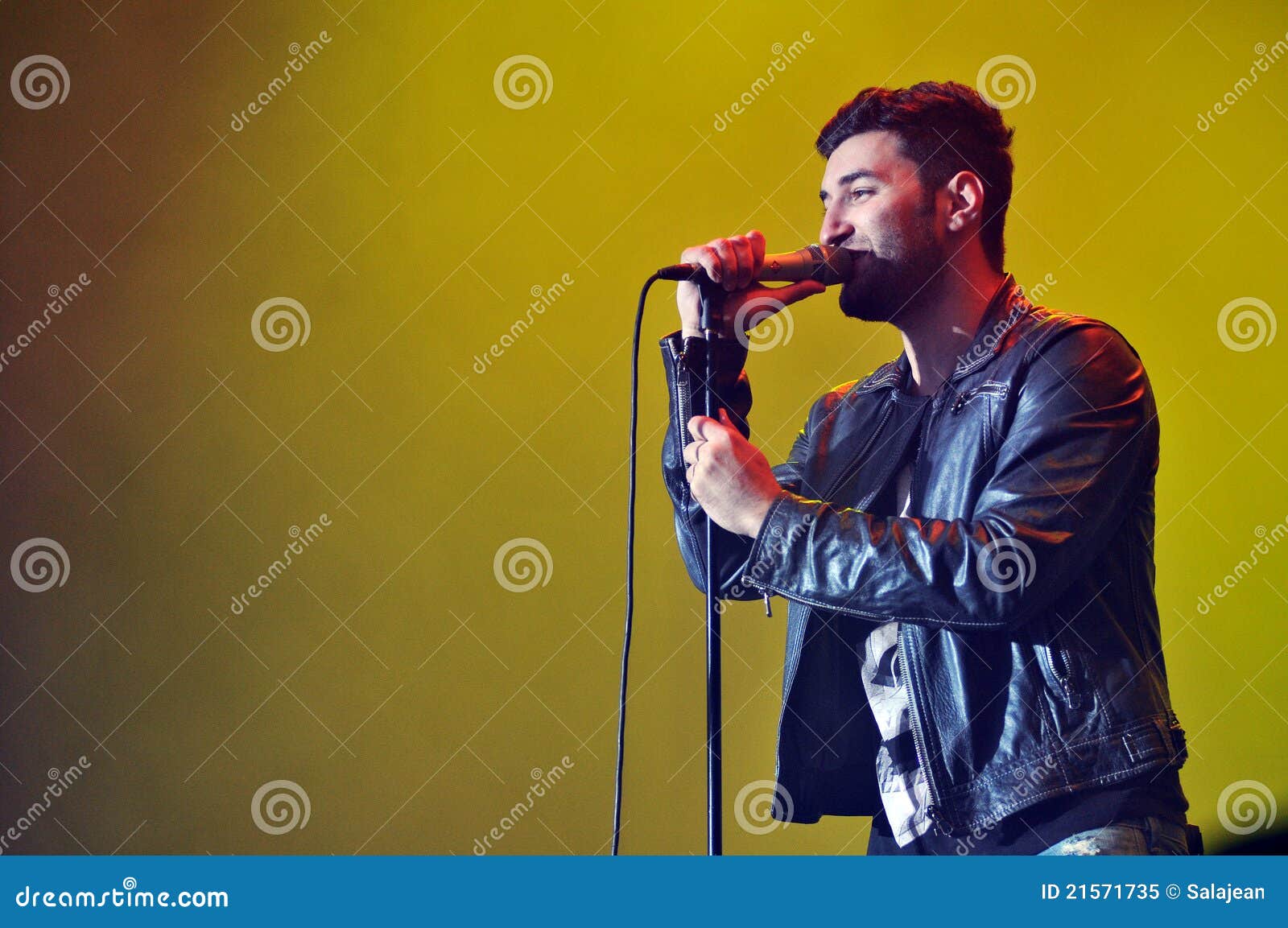 Singer Performing Live with Yellow Background Editorial Image - Image ...