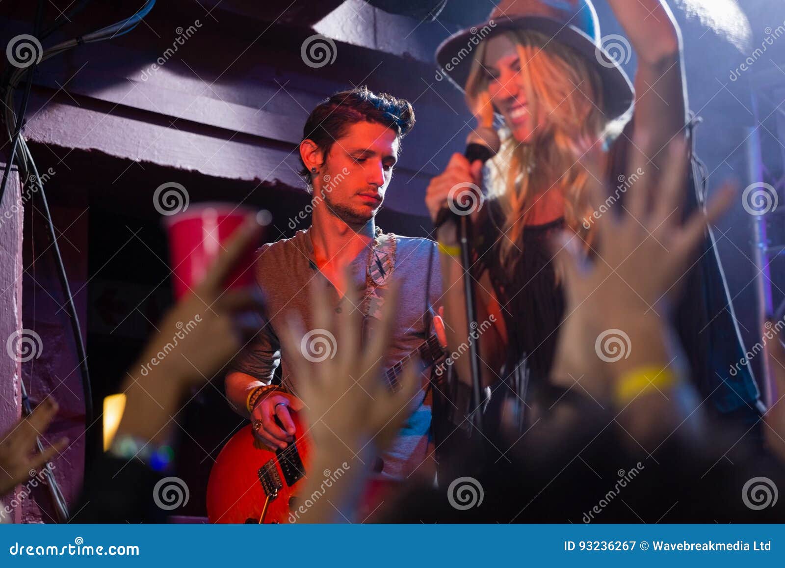 Singer performing on stage stock image. Image of festival - 93236267