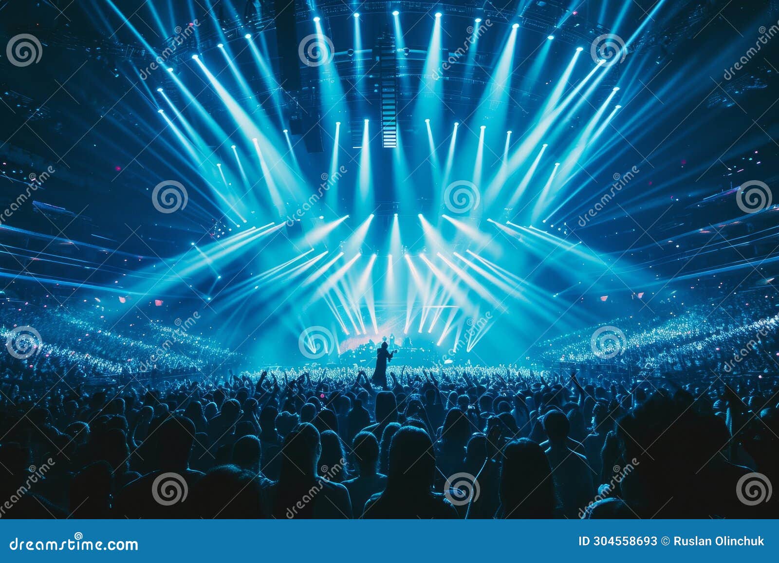 Singer Performs a Musical Concert on Stage in a Huge Packed Stadium ...